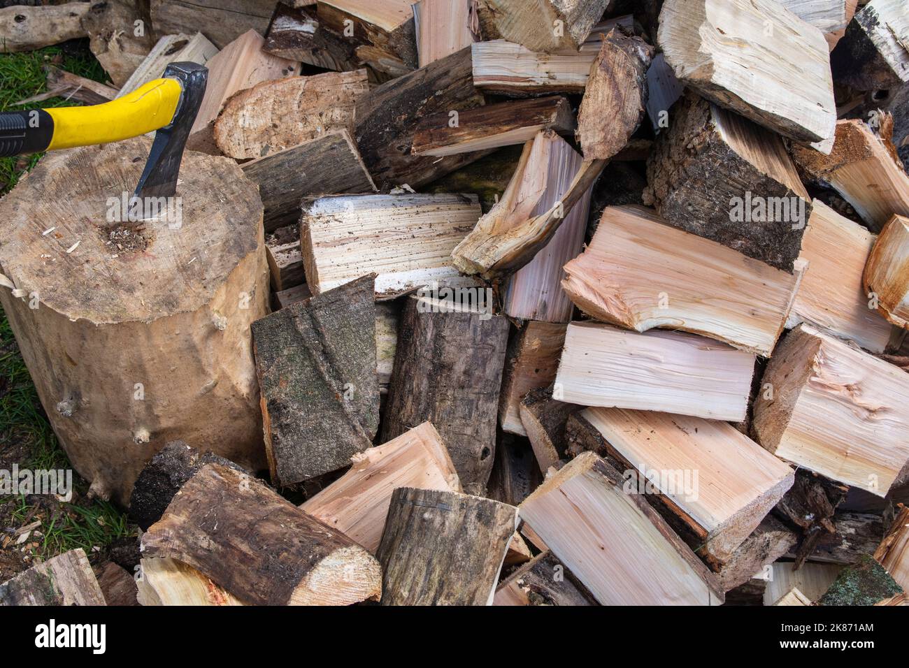 Tree trunks cut and chopped in a heap ready to be laid Stock Photo - Alamy