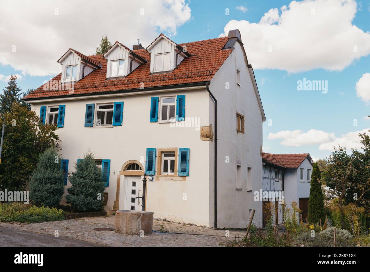 Traditional small house with beautiful outdoor decor facade in Germany ...