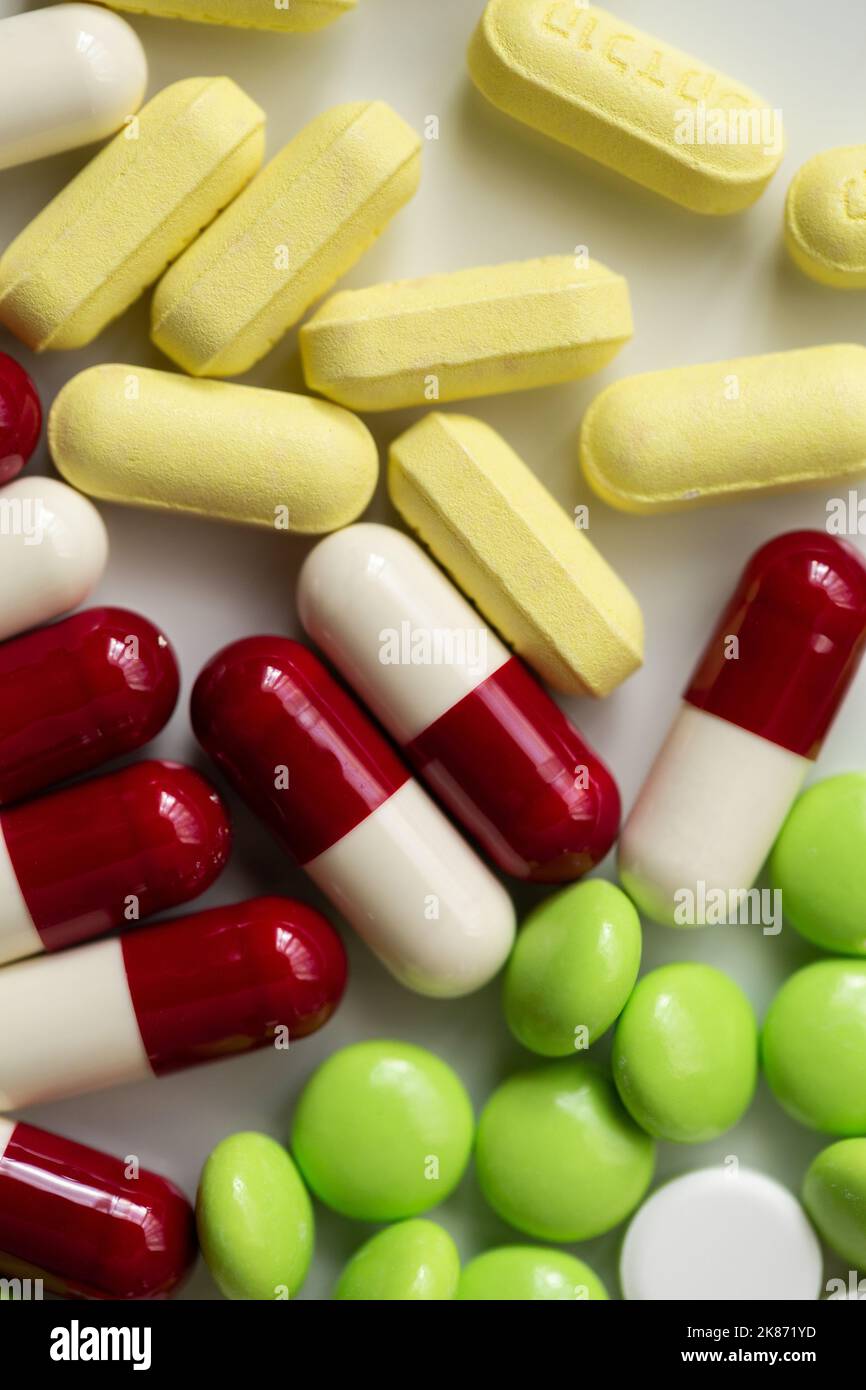 A lot of different pills on grey background Stock Photo - Alamy
