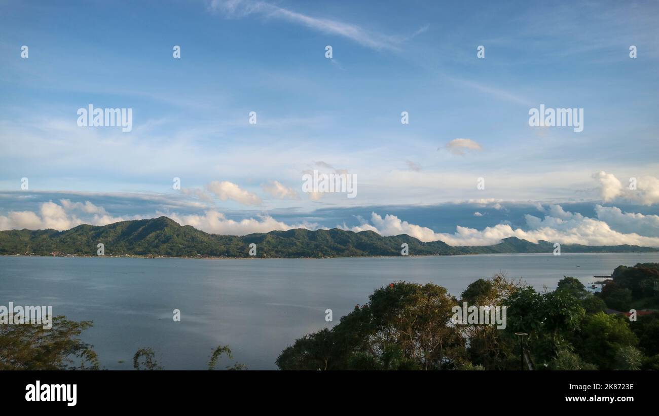 amazing tondano lake surrounded by beautiful hills Stock Photo - Alamy