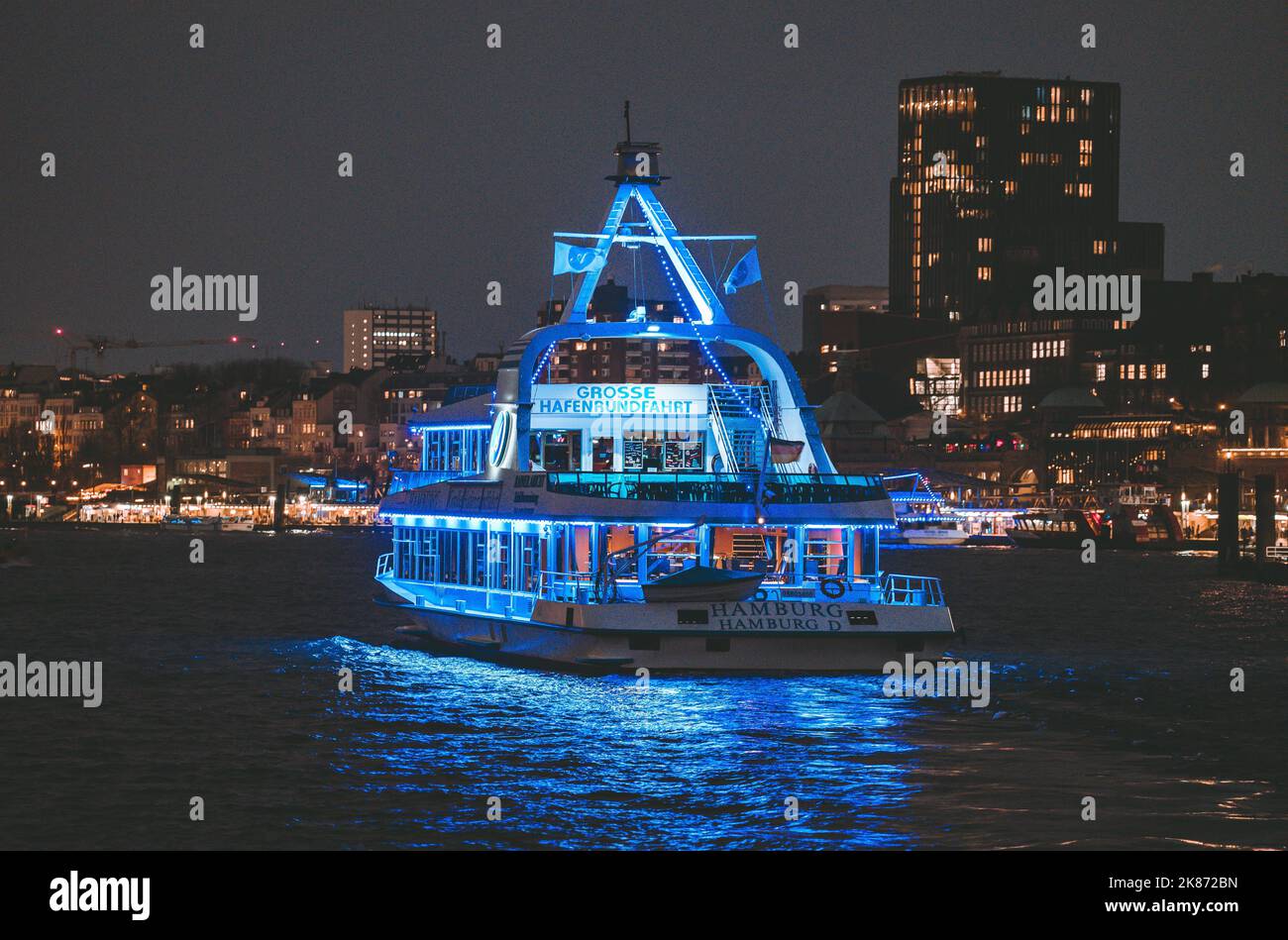 Blue lighted Ship on Elbe River in Hamburg Stock Photo - Alamy