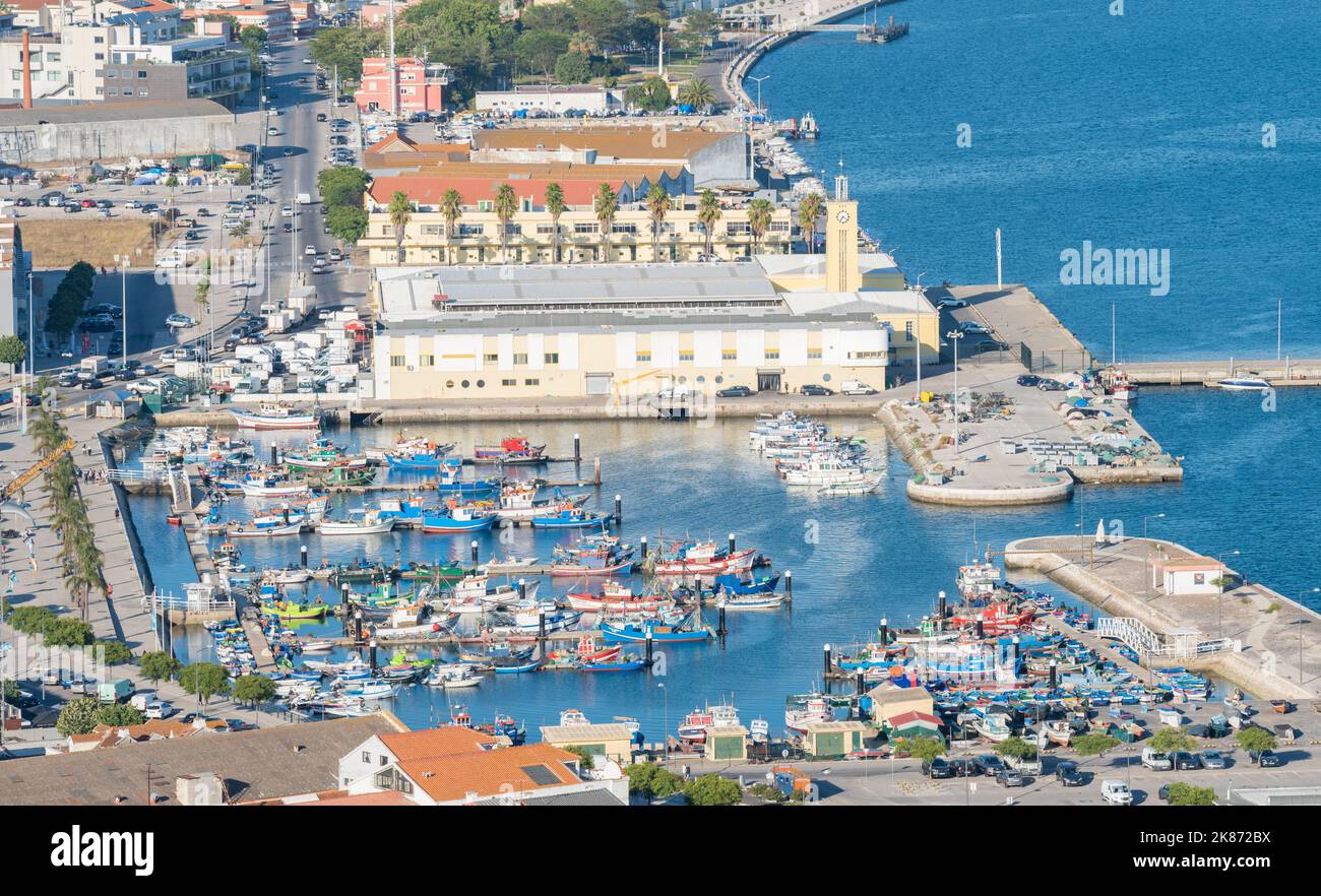 A bird's-eye shot of buildings by a fishing port of the city Setubal ...