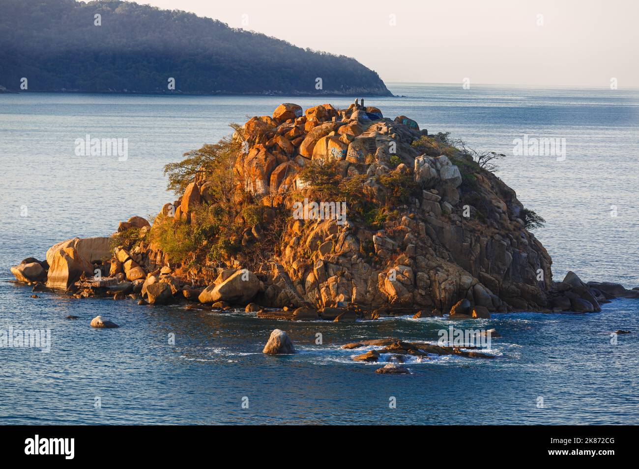 A beautiful shot of a small rocky island in the sea Stock Photo - Alamy