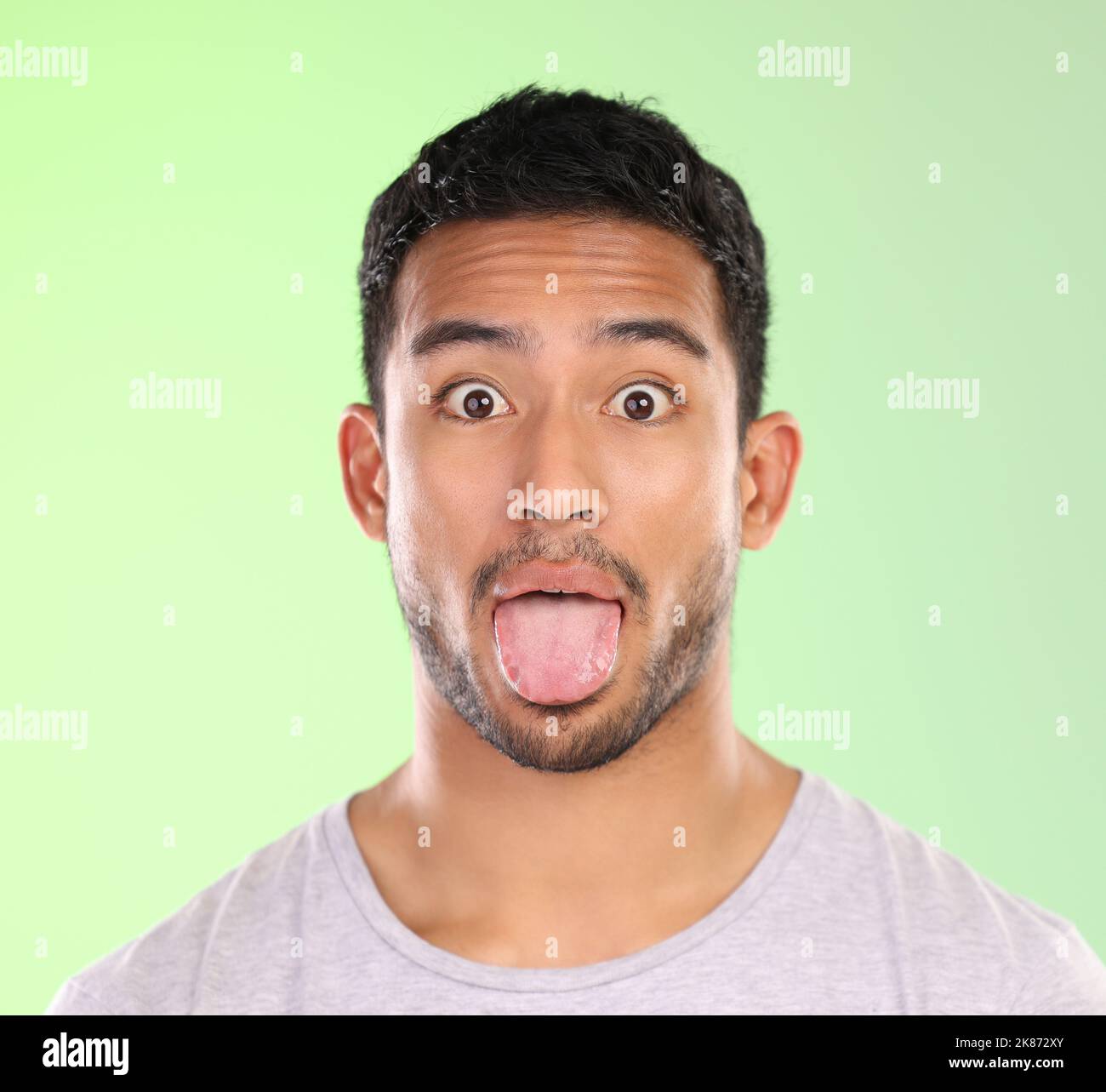 Self portrait against green background hi-res stock photography and ...