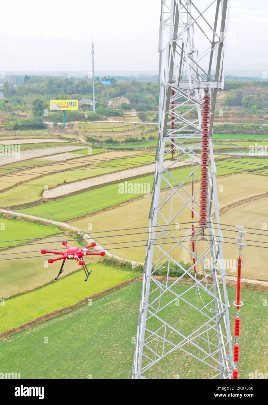 CHUZHOU, CHINA - OCTOBER 21, 2022 - Electric power employees use drones ...