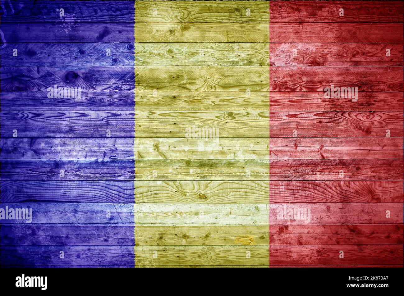 A vignetted background image of the flag of Chad painted onto wooden ...