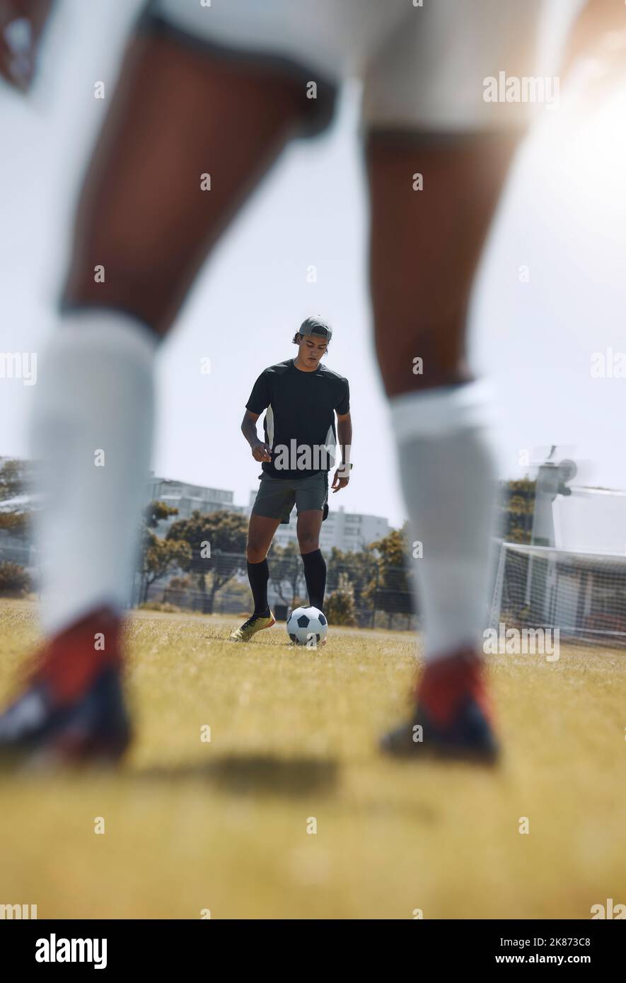 Soccer, sports man and team legs in game training on field while ...