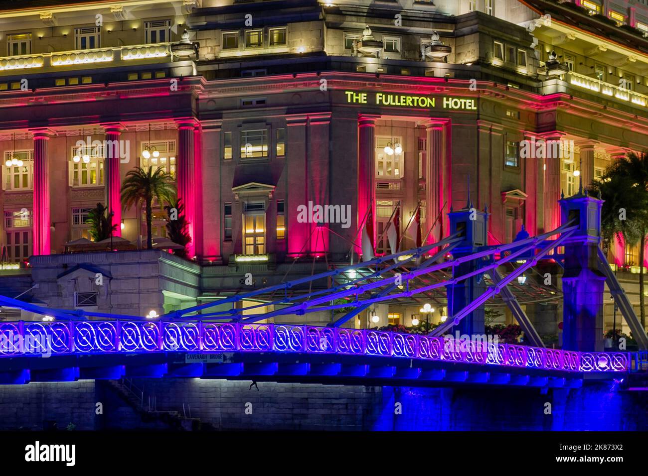 The Fullerton Hotel illuminated at night, Boat Quay, Singapore Stock ...