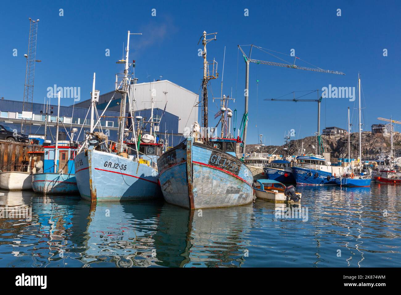 A view commercial fishing and whaling boats in the inner harbor in the ...