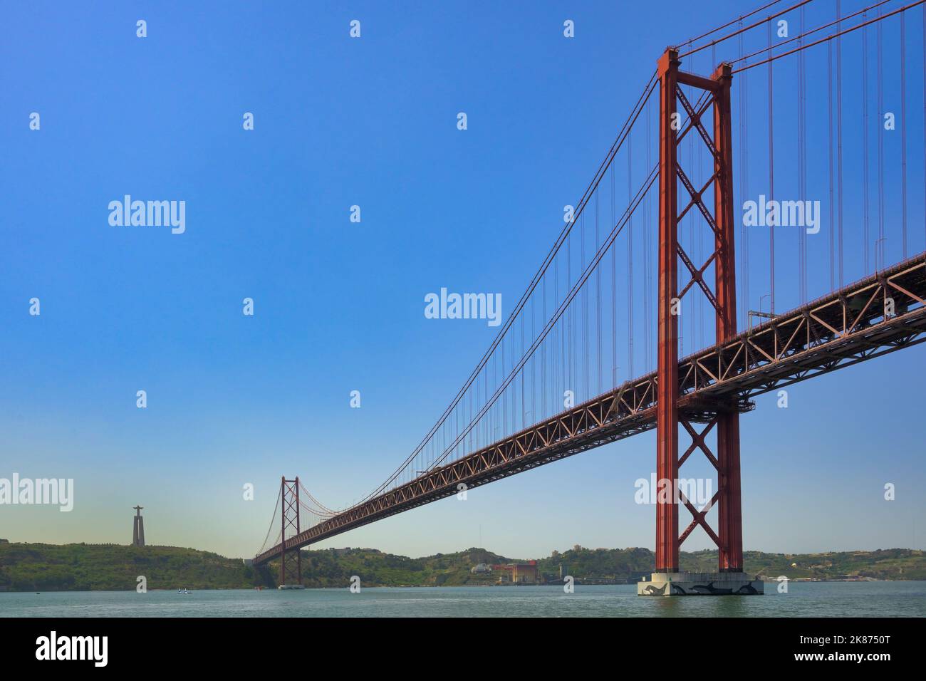 25 April suspension bridge over the Tagus River and Almada Christ ...