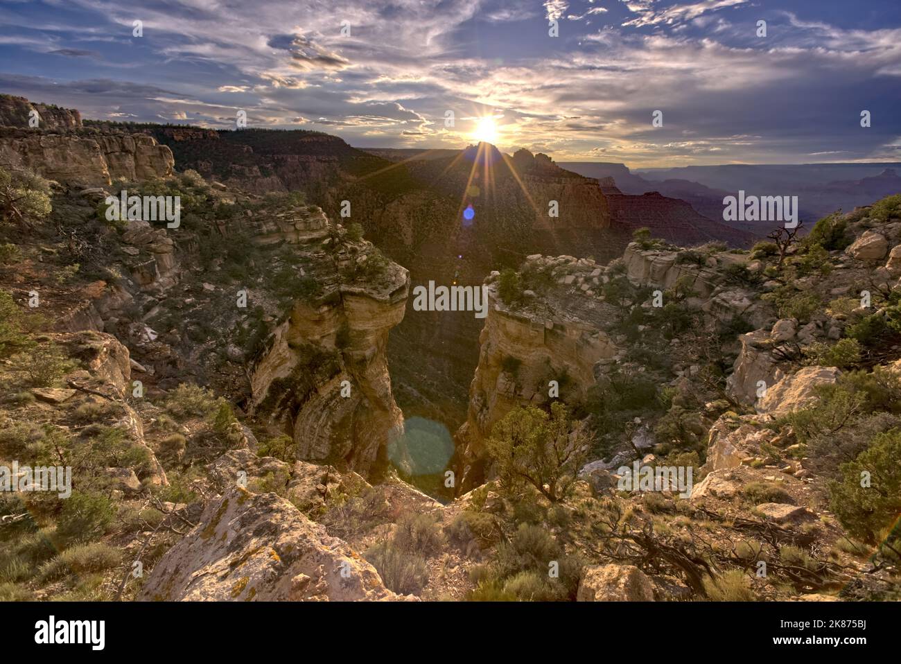Coronado Falls with the sun setting behind the Sinking Ship at Grand ...