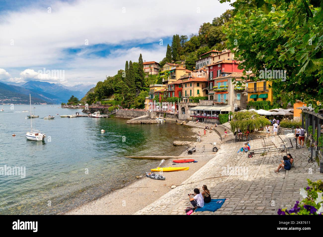 Tourists on the lakeside promenade, Varenna, Lake Como, Como, Lombardy ...