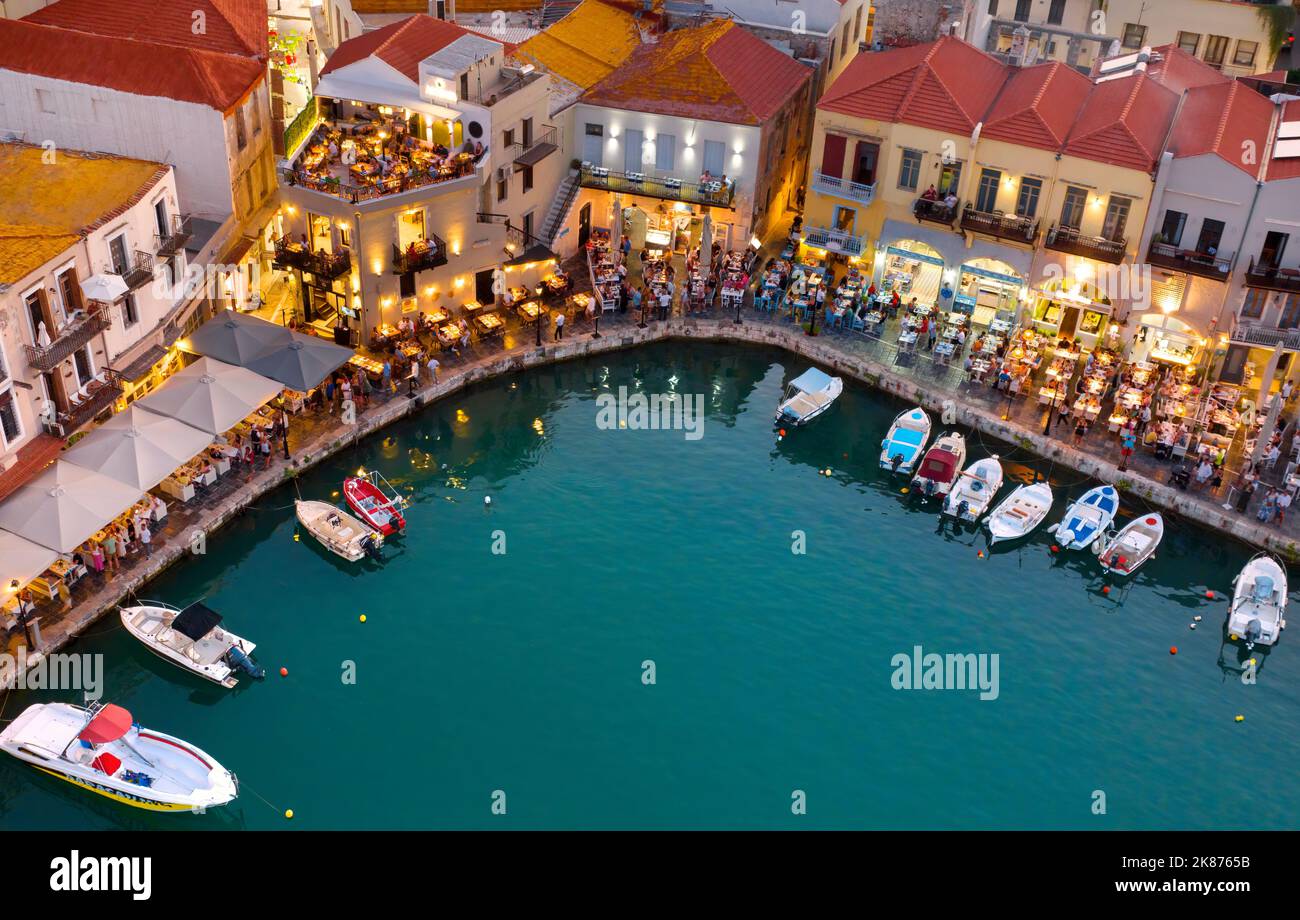 Old Venetian harbour and restaurants at dusk, Rethymno, Crete, Greek ...