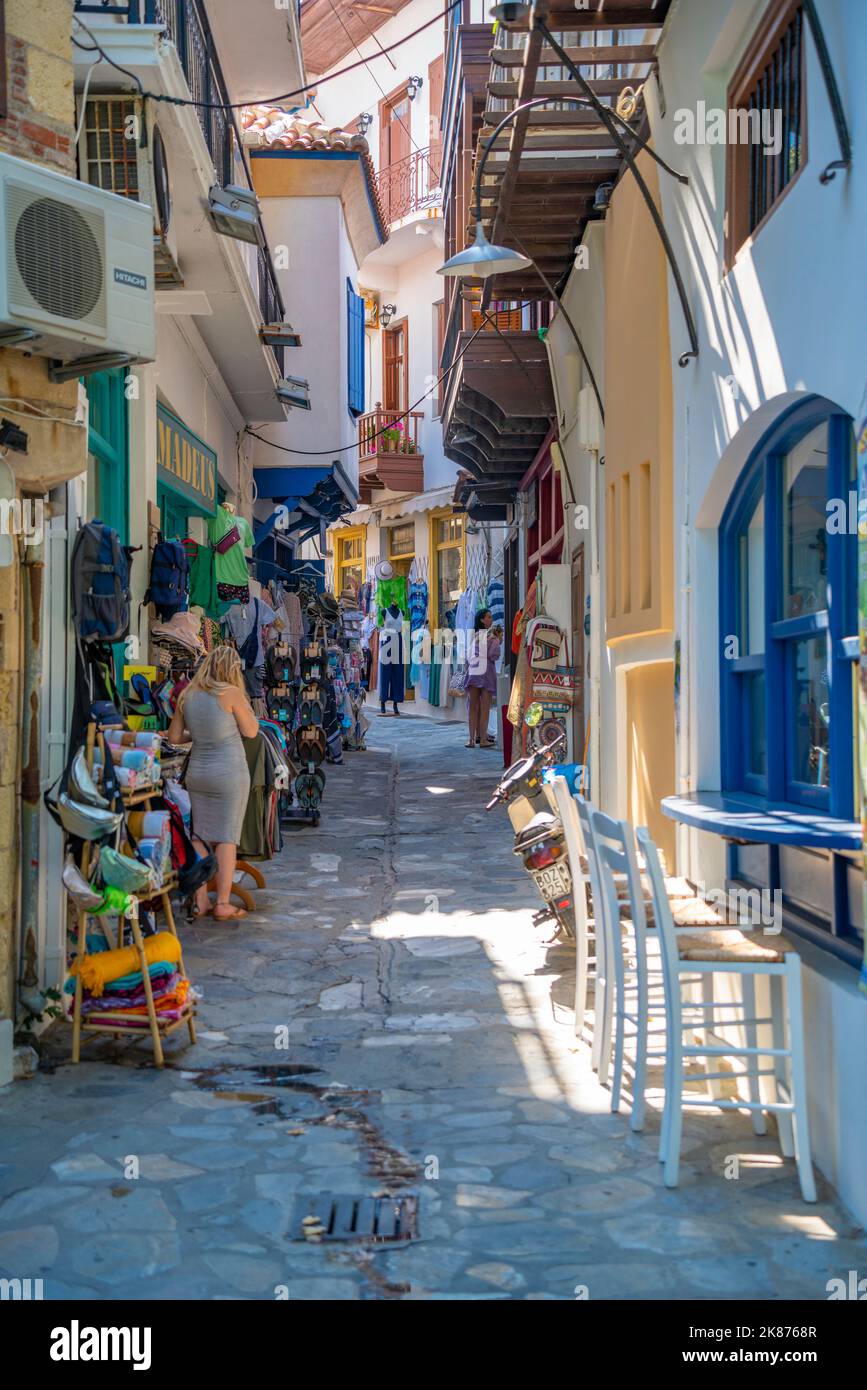 View of shops in narrow street, Skopelos Town, Skopelos Island ...