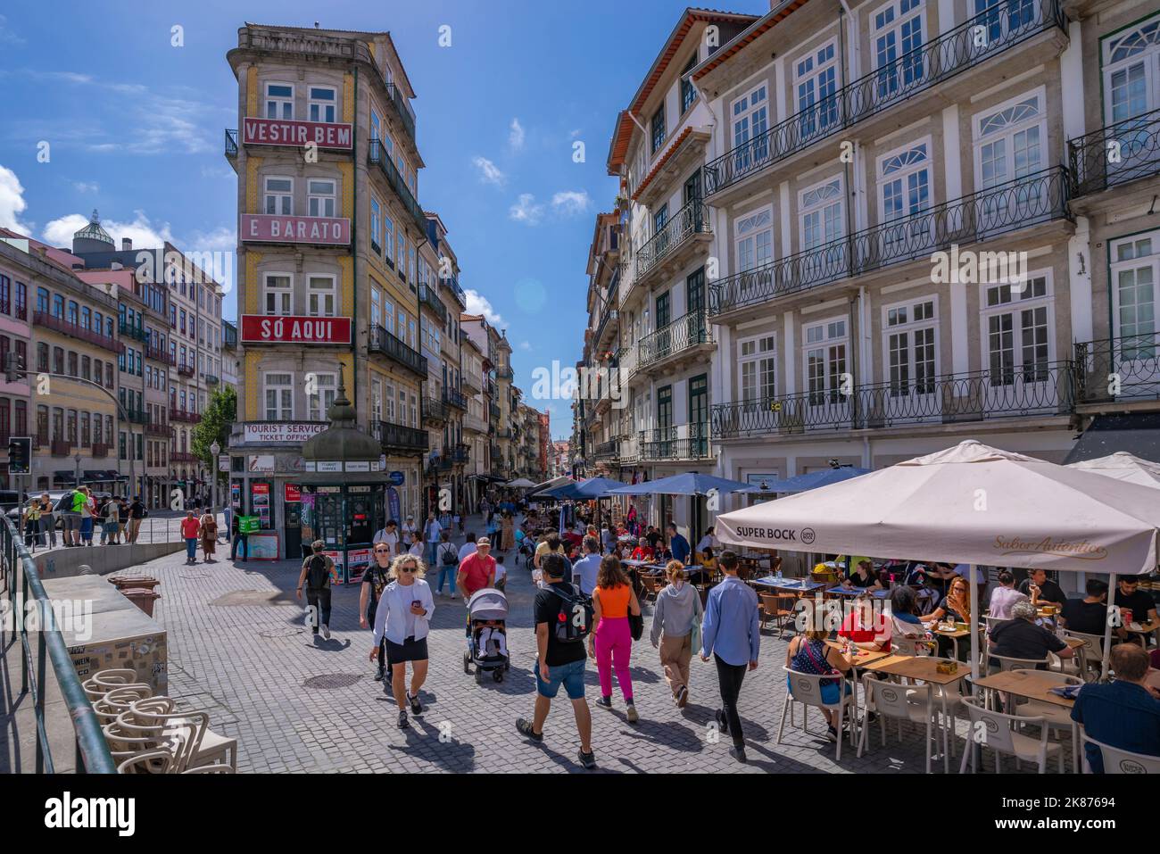 View of cafes, shops and bars on busy Rua das Flores, Porto, Norte ...