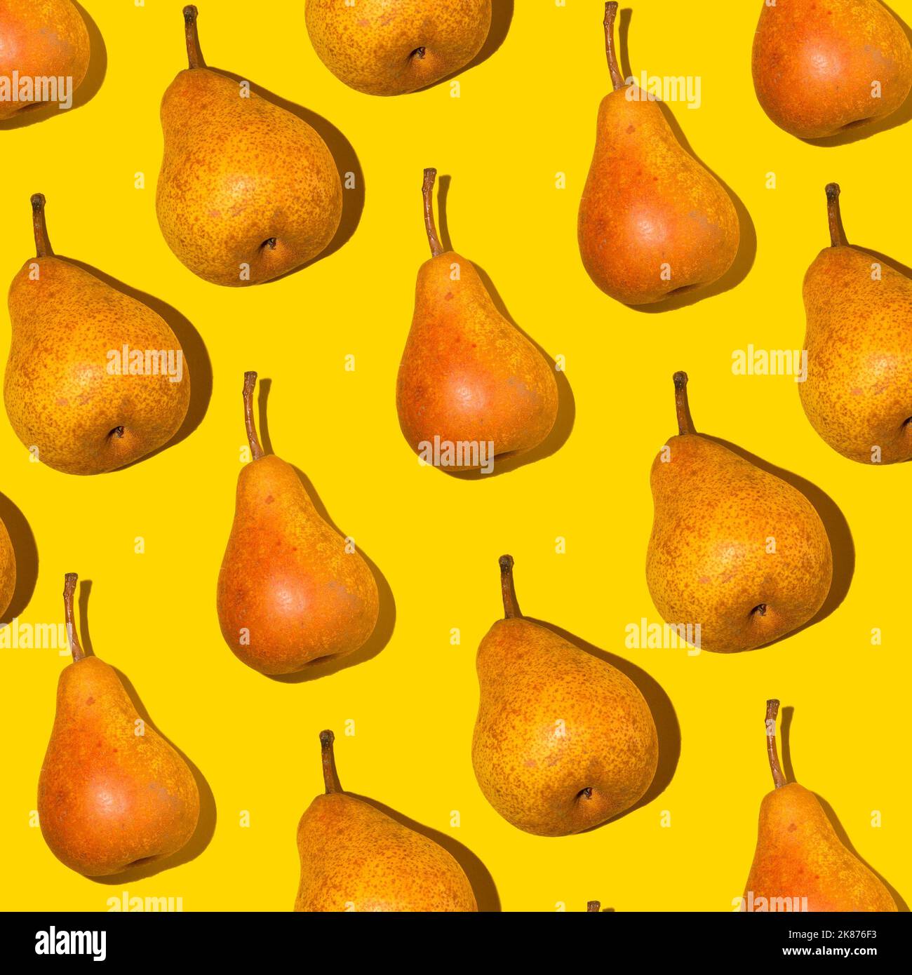 Colorful pear pattern. Orange Bera pears on a yellow background. Ripe ...