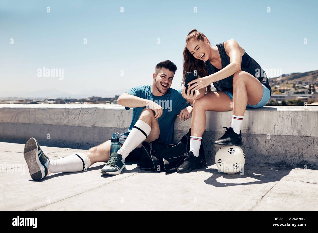 Woman man laughing soccer outdoors hi-res stock photography and images ...
