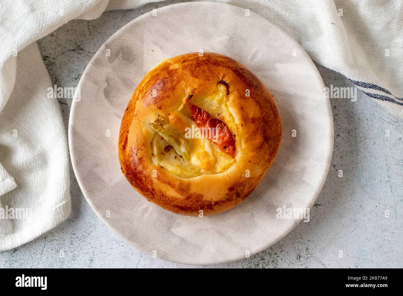 Turkish bagel pogaca with cheddar, tomato and pepper. Traditional ...