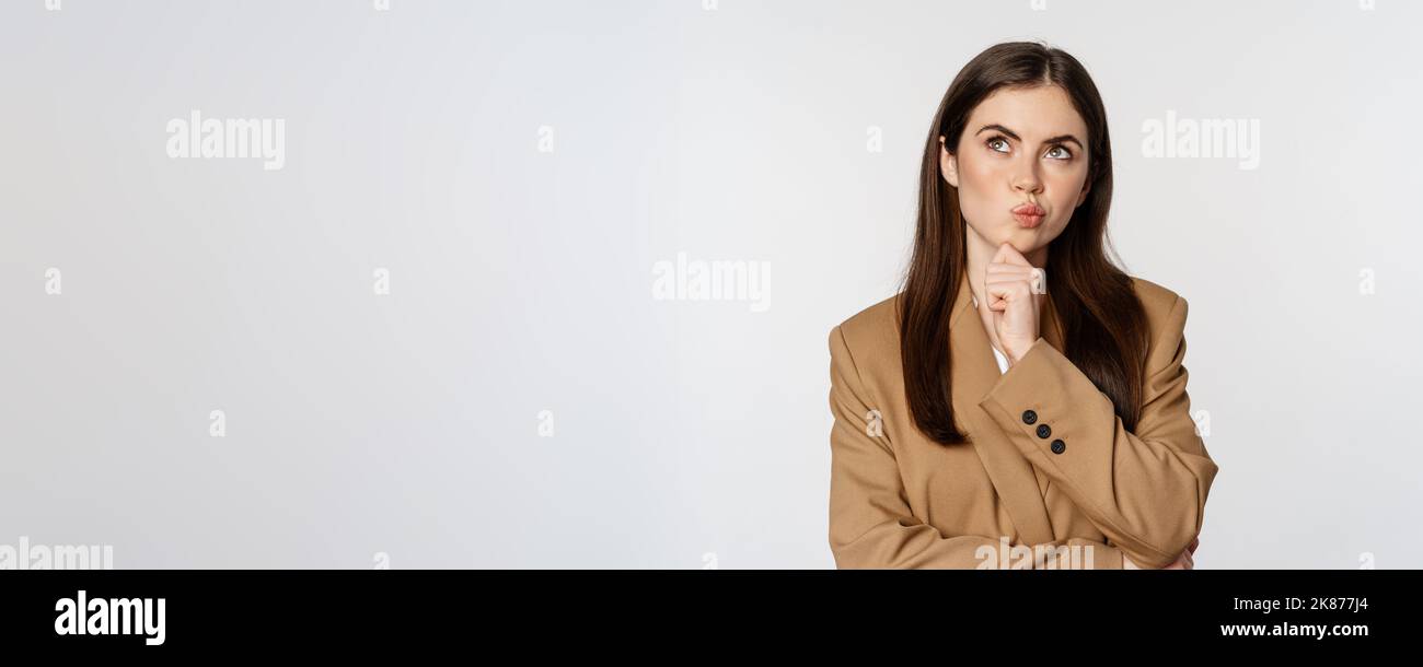 Image of businesswoman thinking, corporate woman looking thoughtful ...