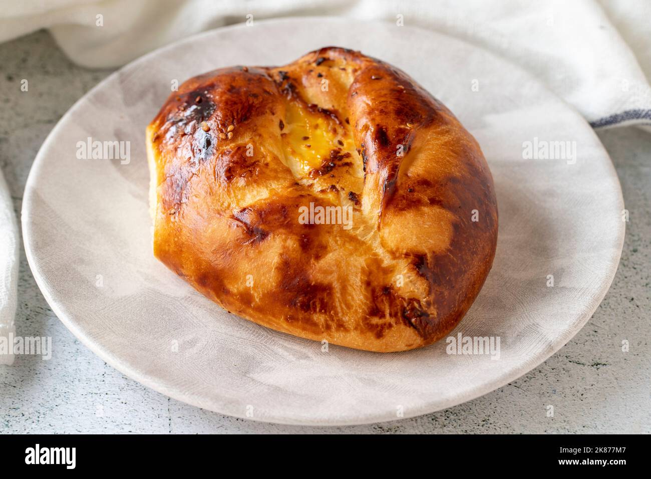 Turkish pogaca with cheddar. Traditional flavors. Pogaca on gray ...