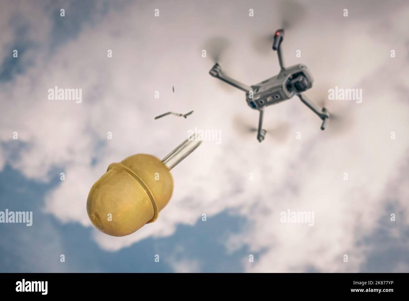 Concept using quadrocopters in smart war. A grenade falling from a ...