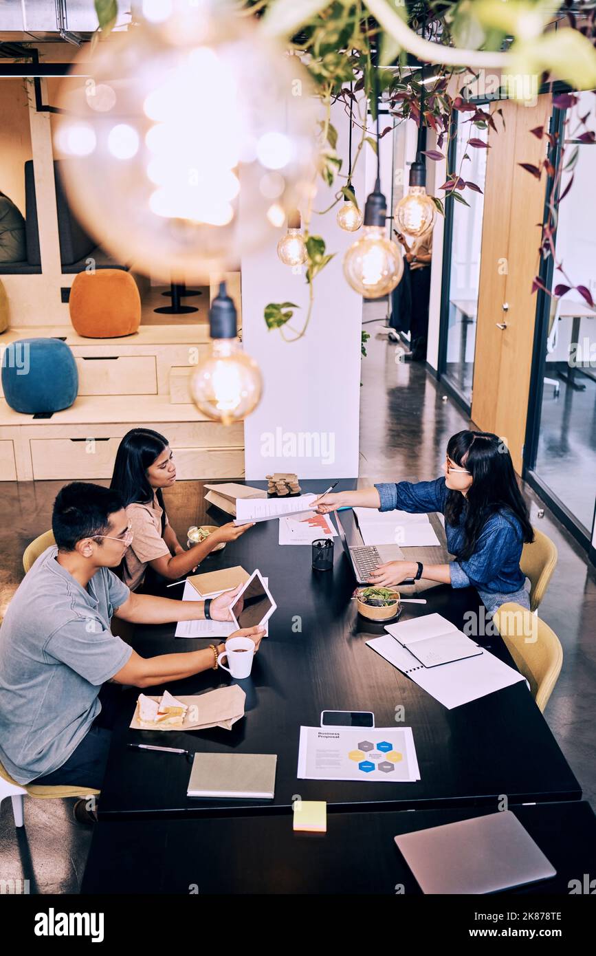 Im not understanding this will you help. a group of creatives eating ...