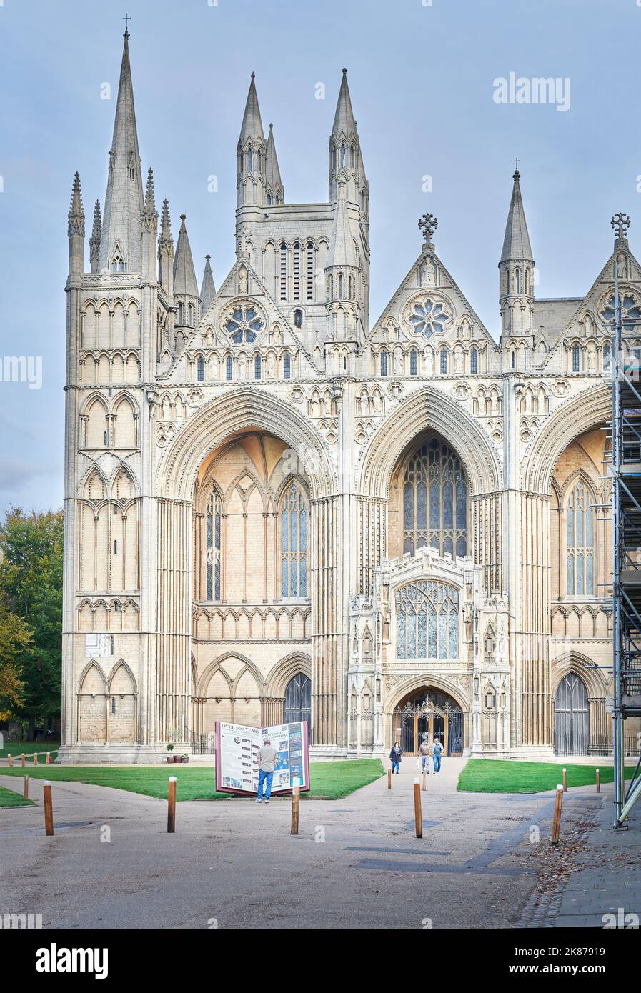 People outside the west front of the medieval christian cathedral at ...