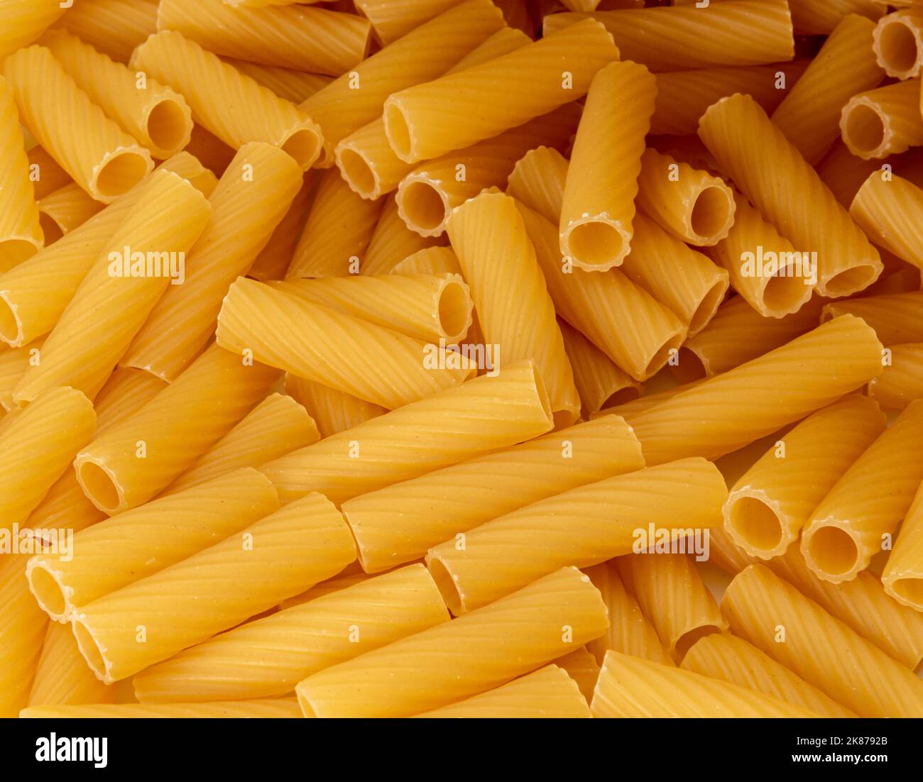 Italian macaroni pasta called tortiglioni, top view Stock Photo - Alamy