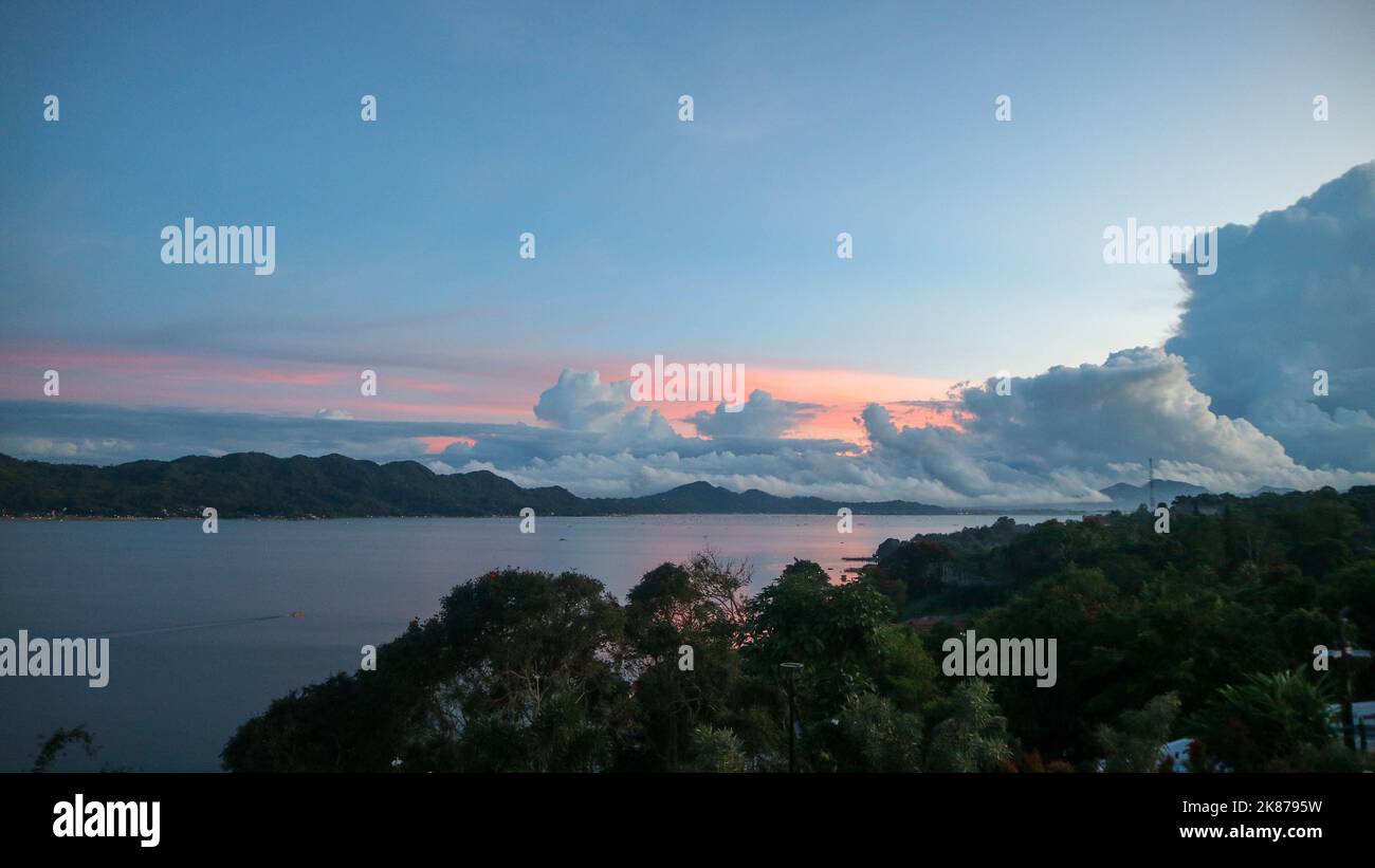 the amazing tondano lake surrounded by beautiful hills Stock Photo - Alamy