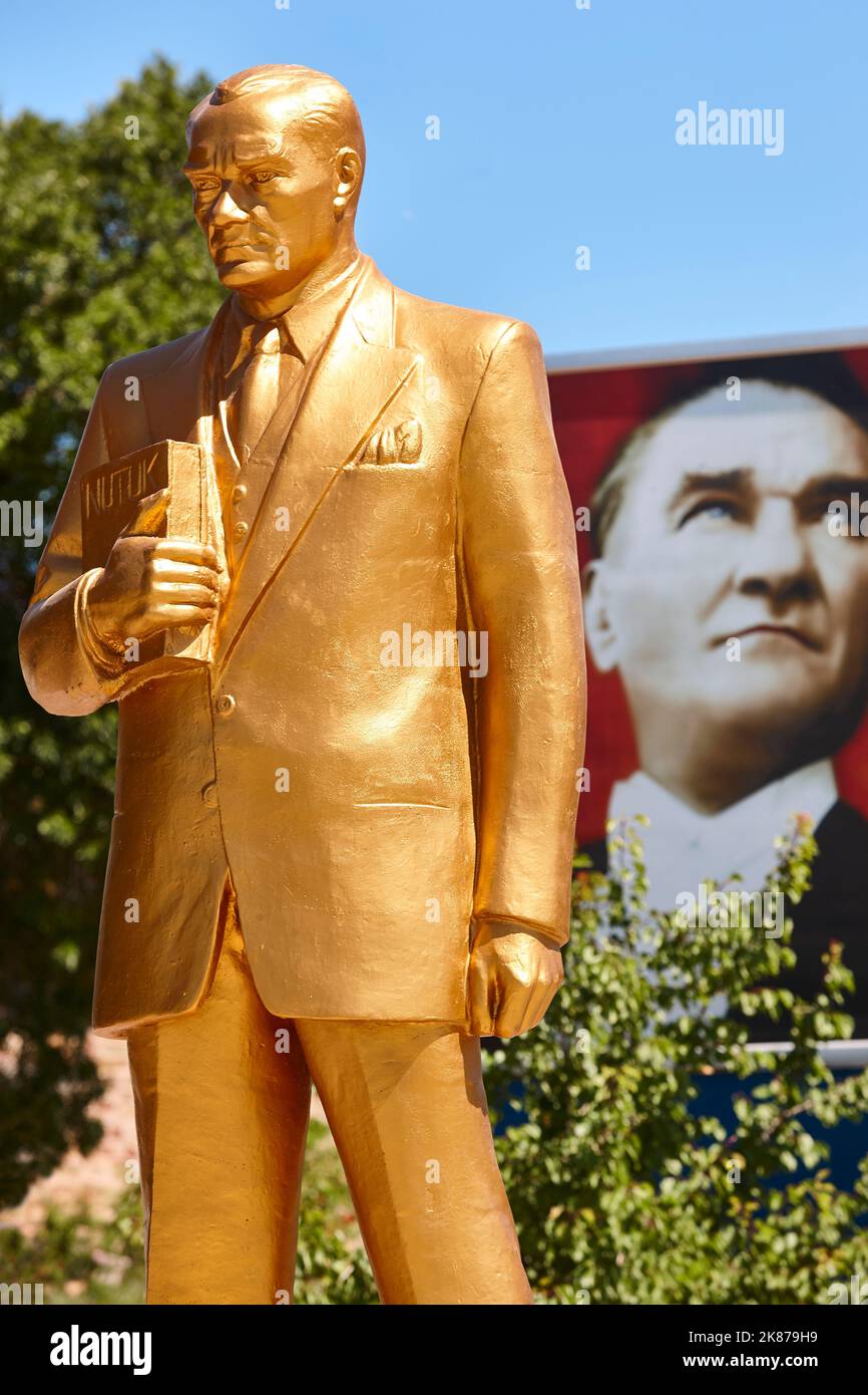 Ataturk golden statue and huge portrait memorial in Hacibektas. Turkey ...