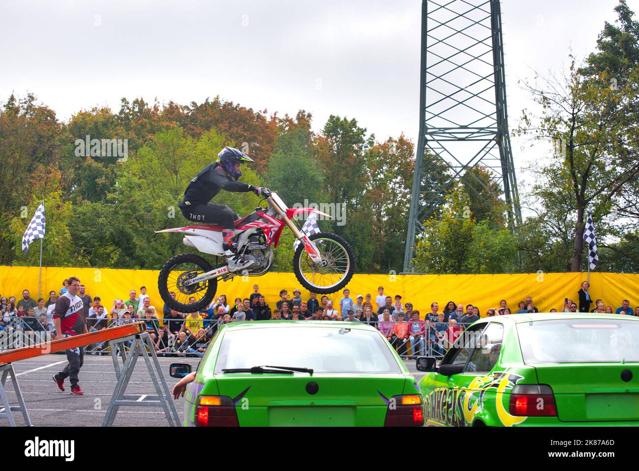 FRANKFURT AM MAIN, GERMANY - SEPT 2022: stuntman riding Honda CRF 450R ...