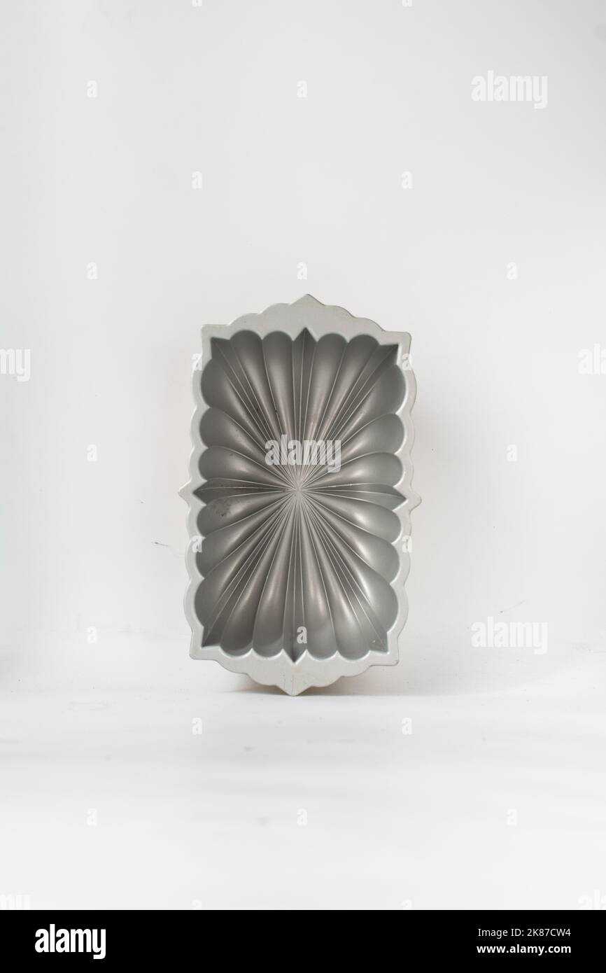 loaf baking pan with patterns on white background, cast iron loaf pan ...