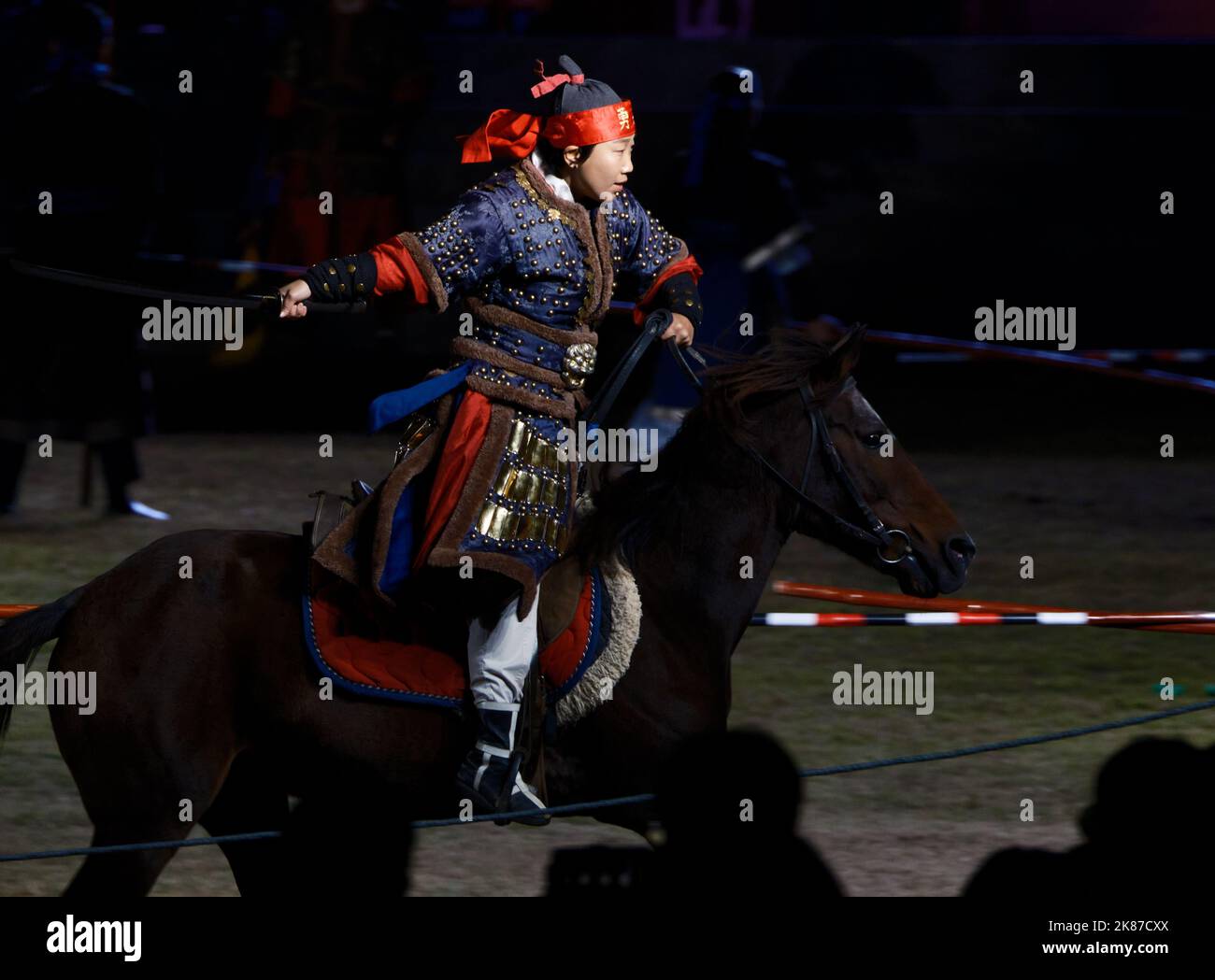 Suwon, Gyeonggi-do - 10 07 2022: A person is riding a horse and getting ...