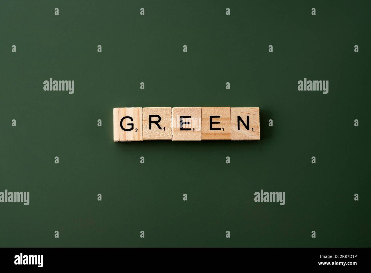 Green word of the alphabet on wooden cubes Stock Photo - Alamy