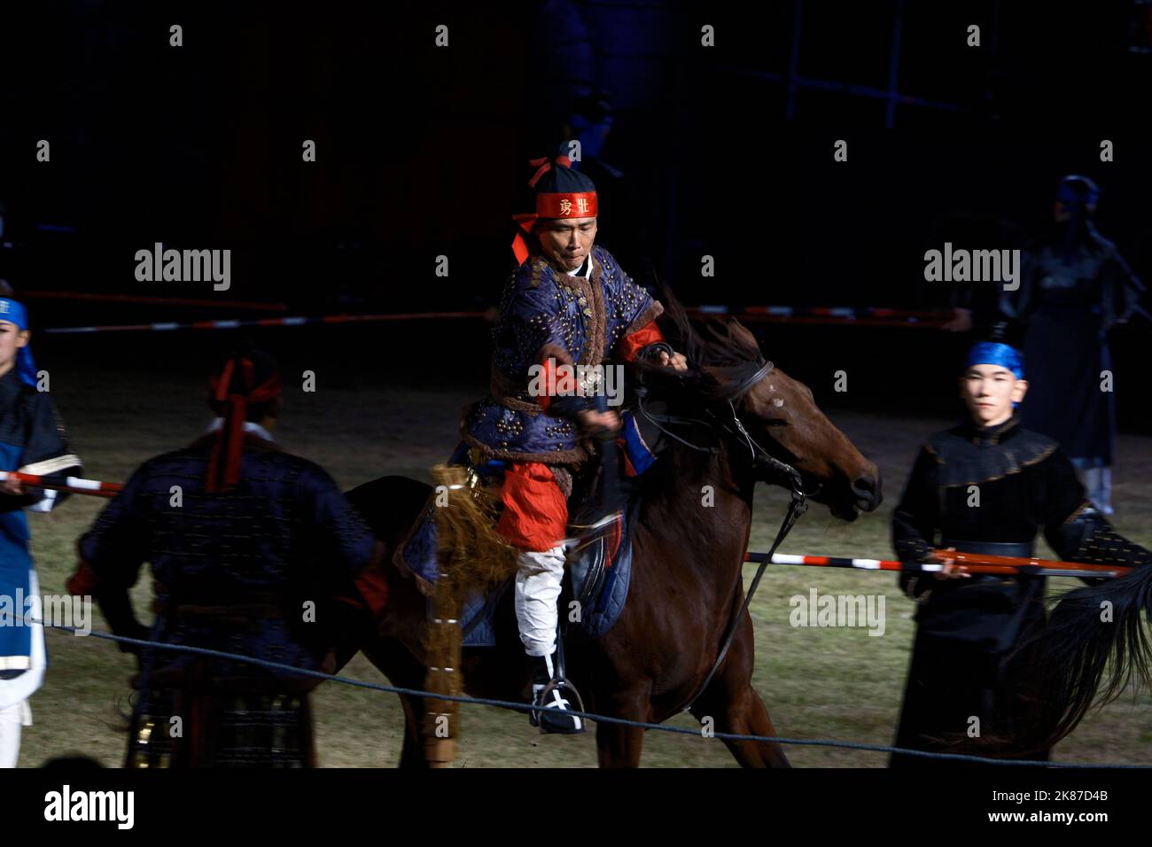 Suwon, Gyeonggi-do - 10 07 2022: A man is riding a horse and swinging ...