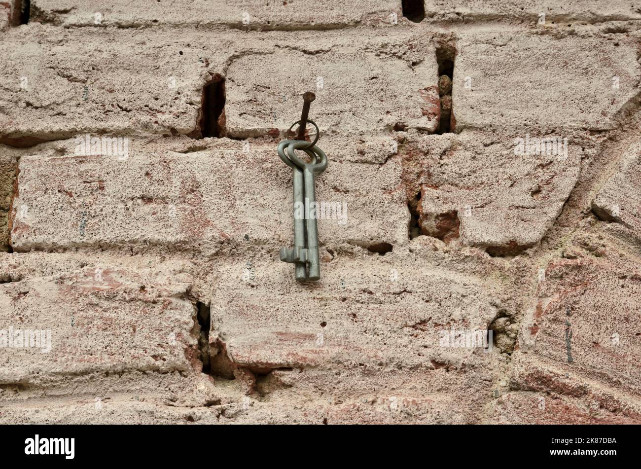 Old brick wall painted and bunch of keys Stock Photo - Alamy