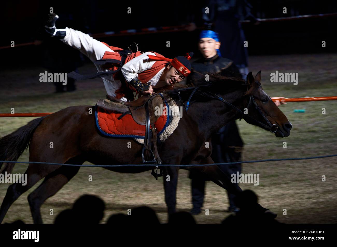 Suwon, Gyeonggi-do - 10 07 2022: A man is getting on a horse in the ...