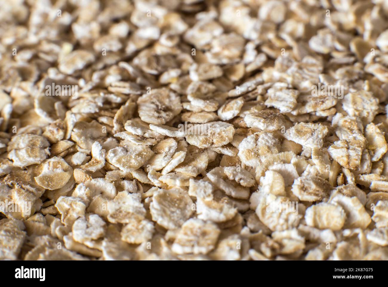 Oat flakes background - macro photo Stock Photo - Alamy