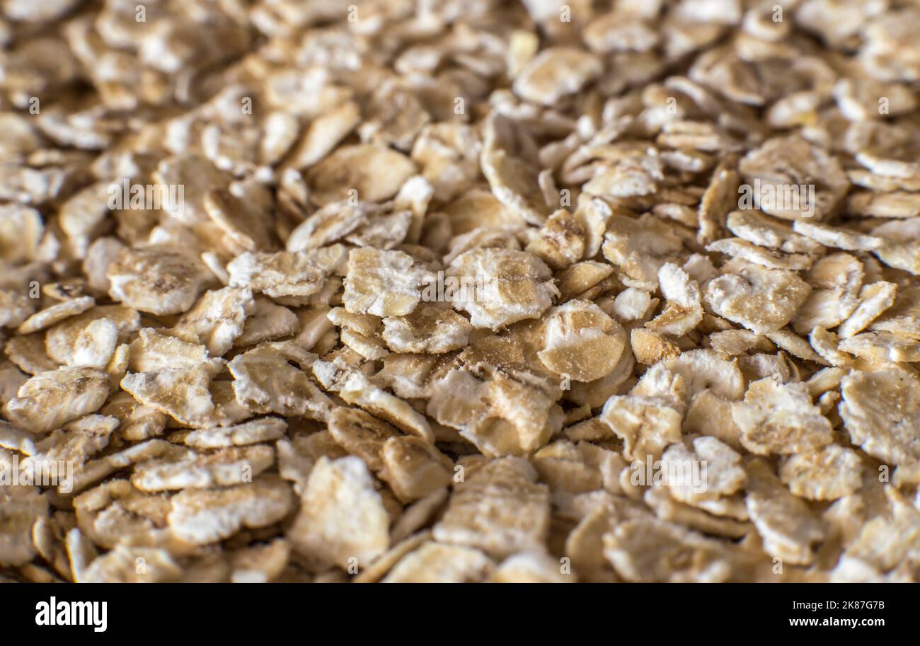 Oat flakes background - macro photo Stock Photo - Alamy