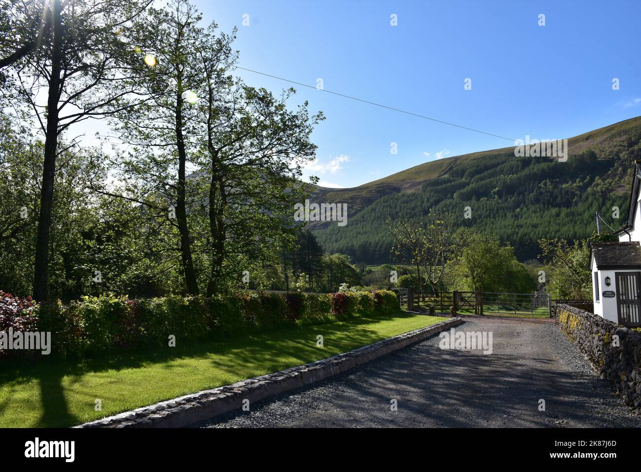 Short lane beside a cottage in teh countryside of Ennerdale Stock Photo ...