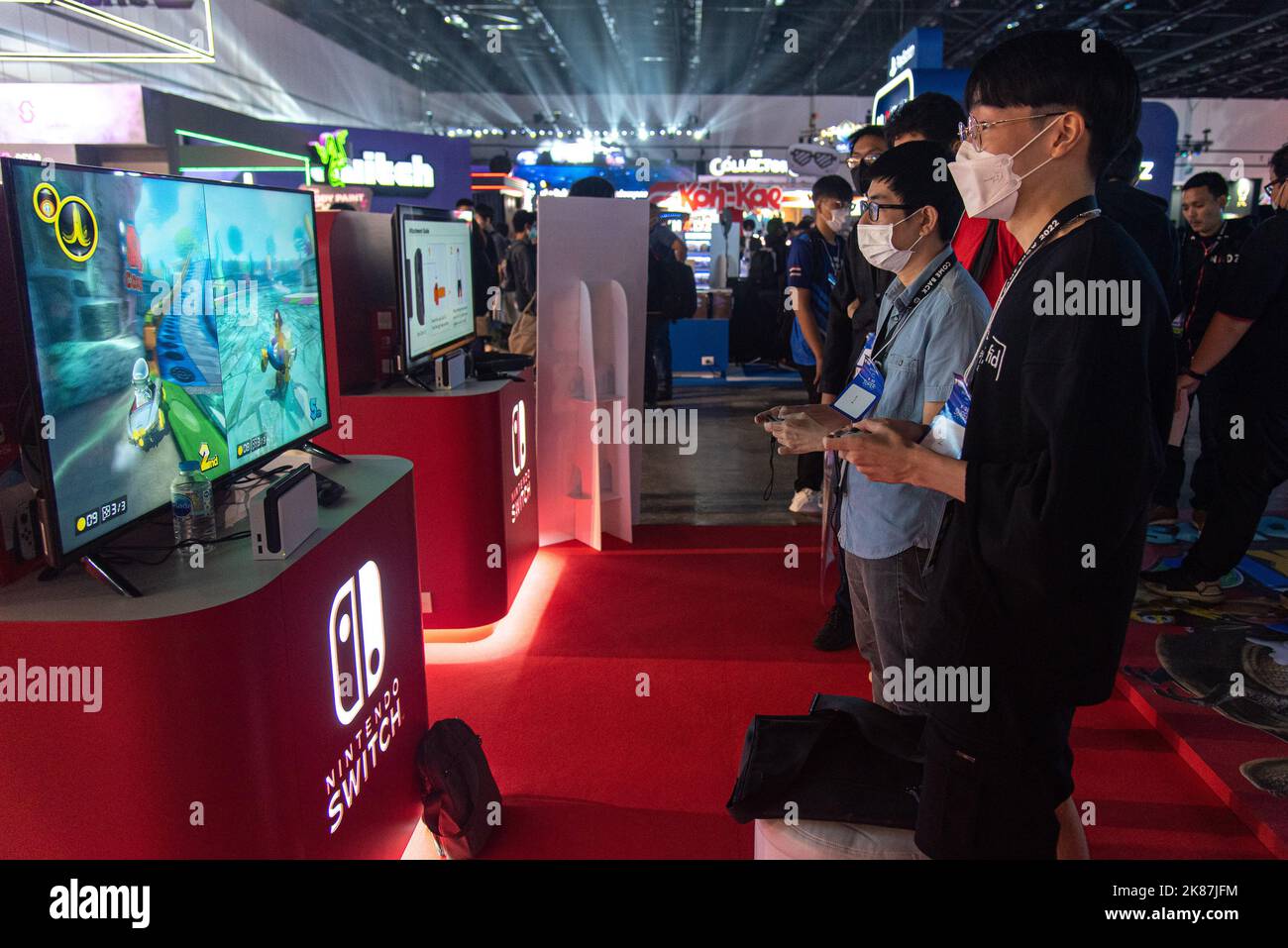 Visitors seen playing a video game by Nintendo Switch during the Thailand Game Show at Queen ...