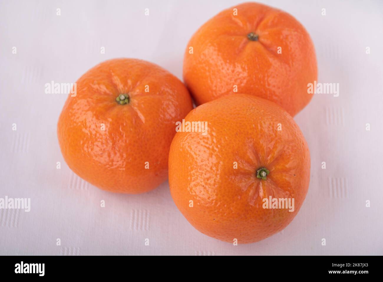 GROUP OF TANGERINES LYING ON A WHITE BACKGROUND Stock Photo - Alamy