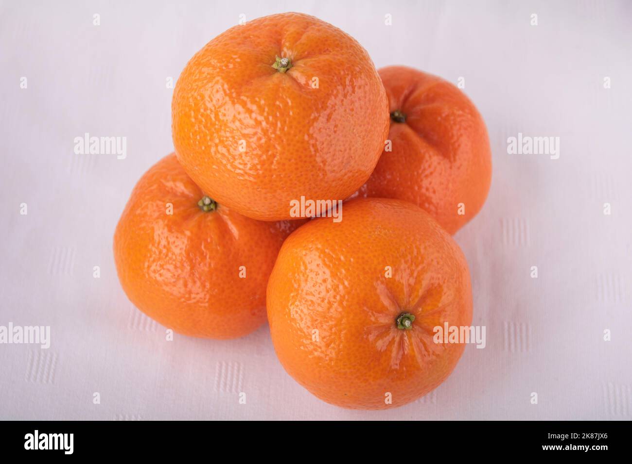 GROUP OF TANGERINES LYING ON A WHITE BACKGROUND Stock Photo - Alamy