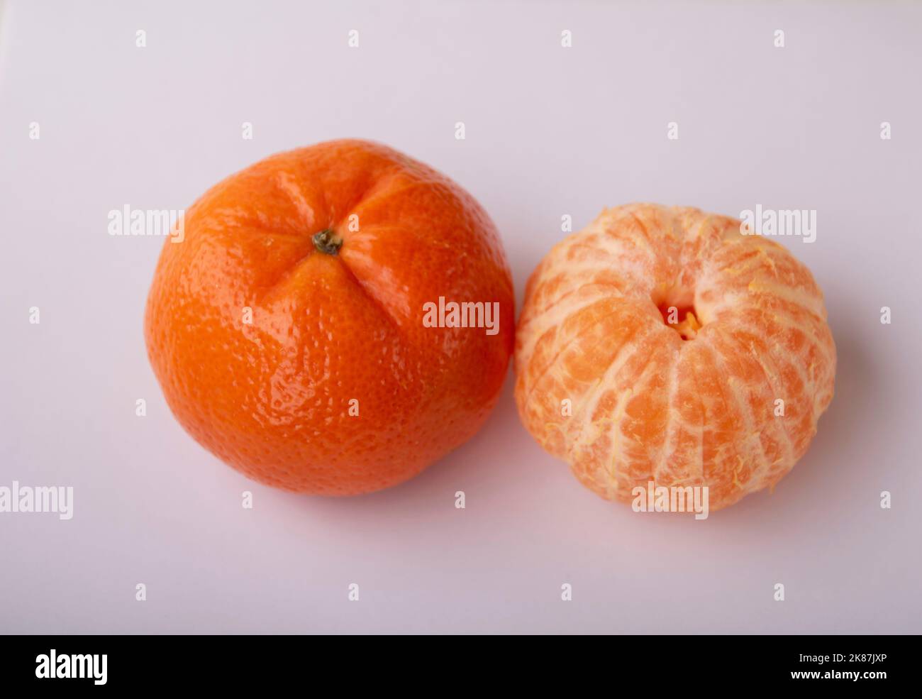 Peeled and unpeeled orange hi-res stock photography and images - Alamy