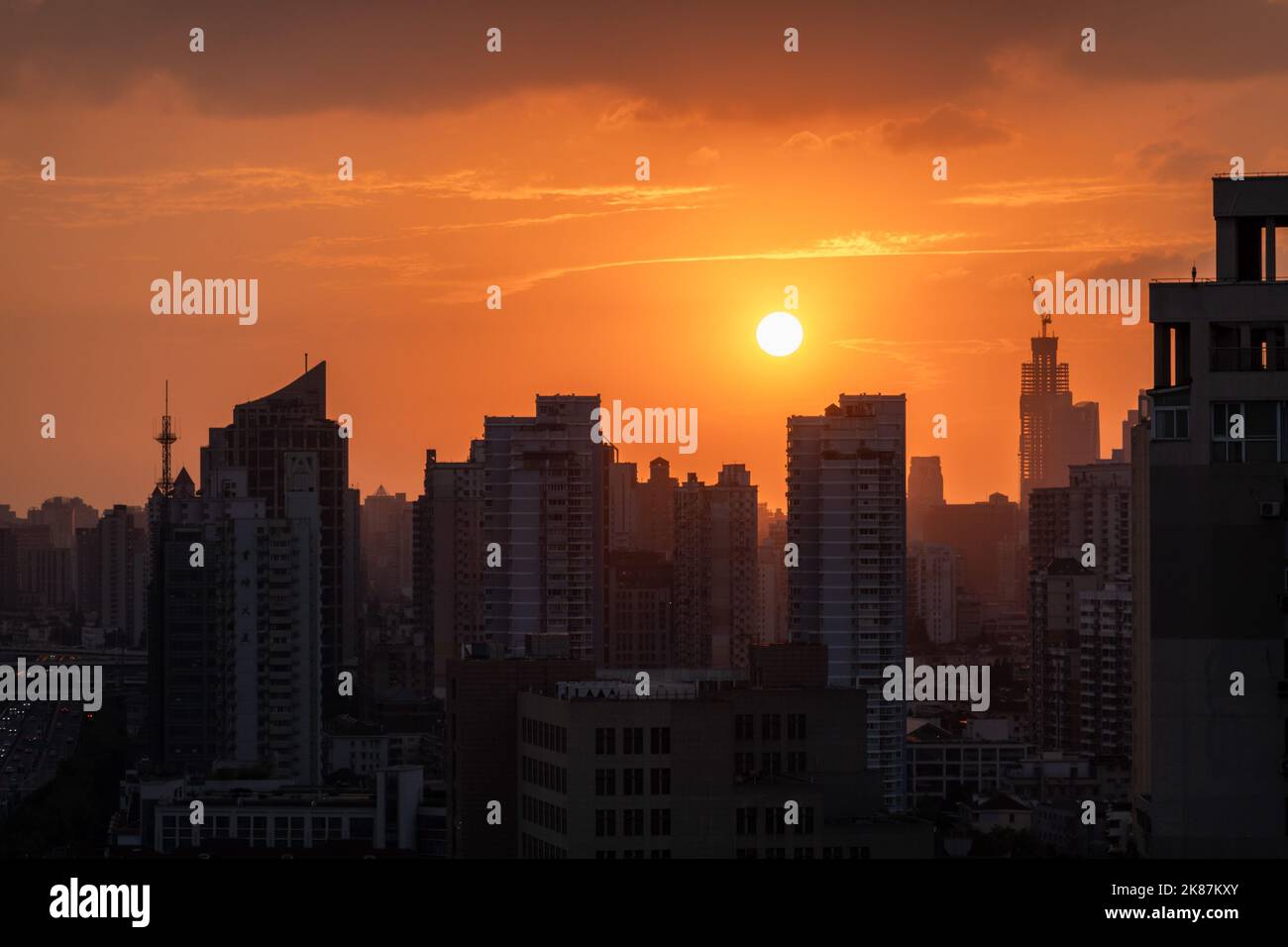SHANGHAI, CHINA - OCTOBER 21, 2022 - Buildings are seen at sunset in ...