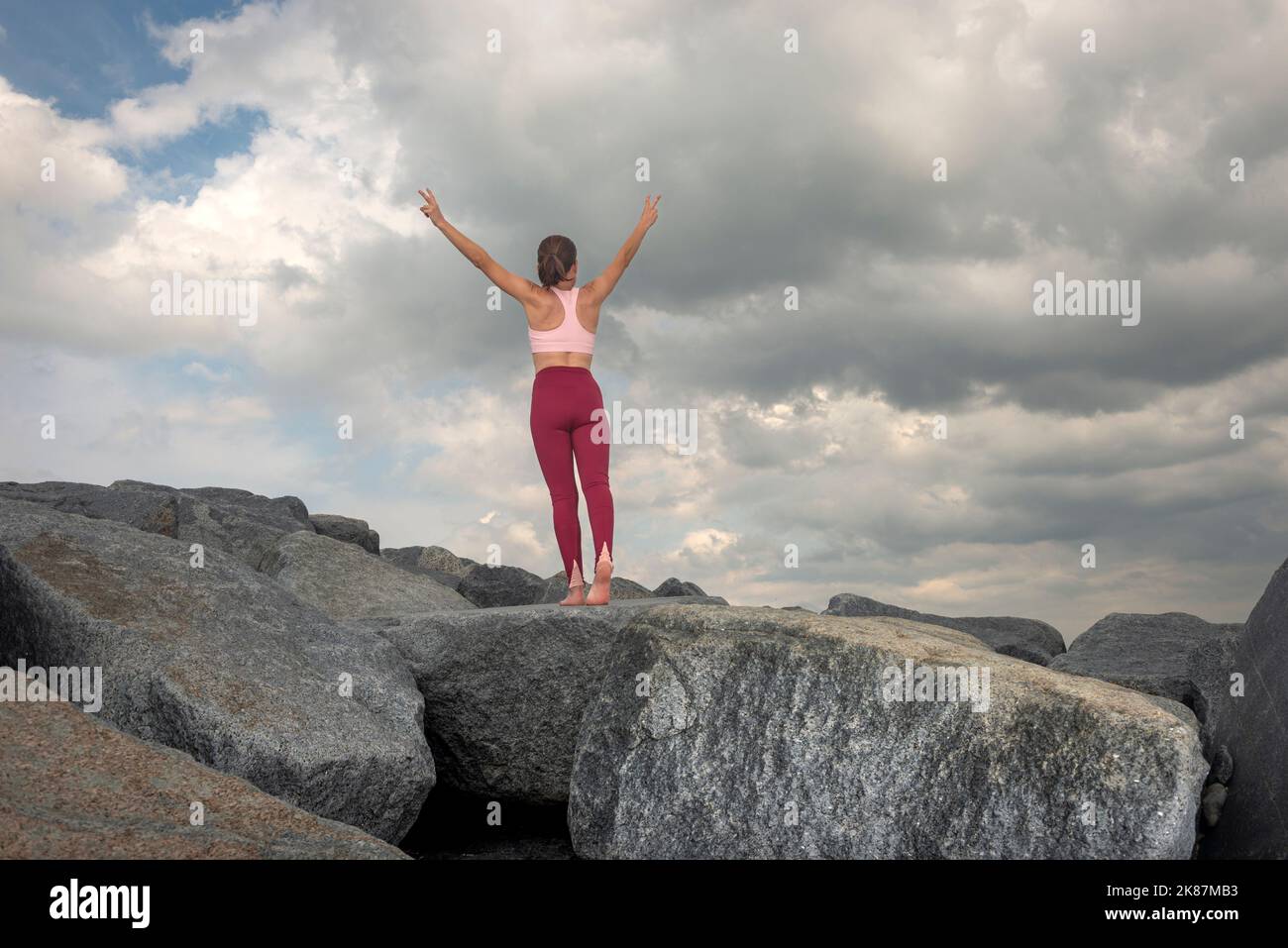 Woman arms outstretched stands hi-res stock photography and images - Alamy
