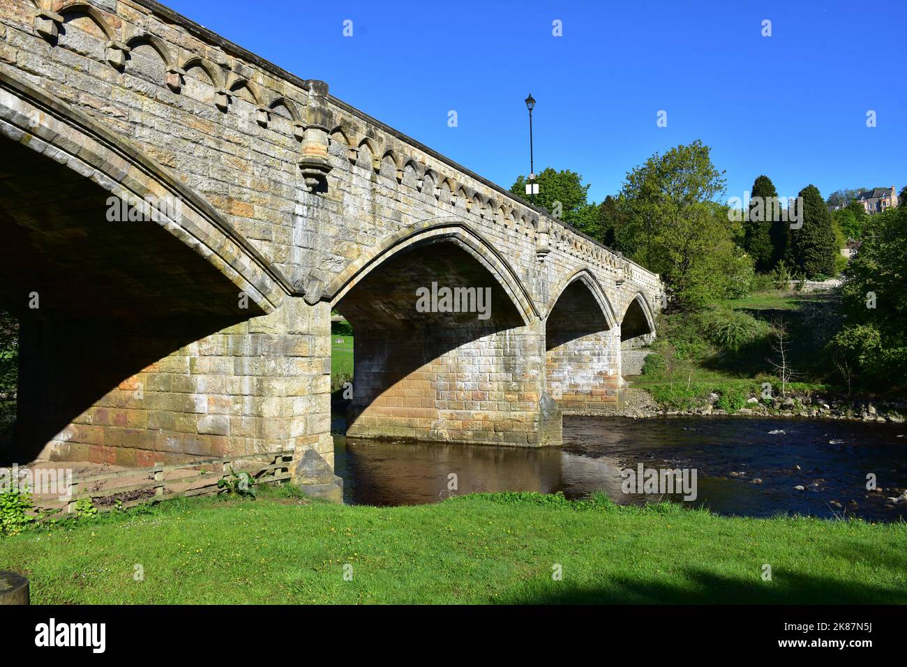 Beautiful stone bridges with arches over a river Stock Photo - Alamy