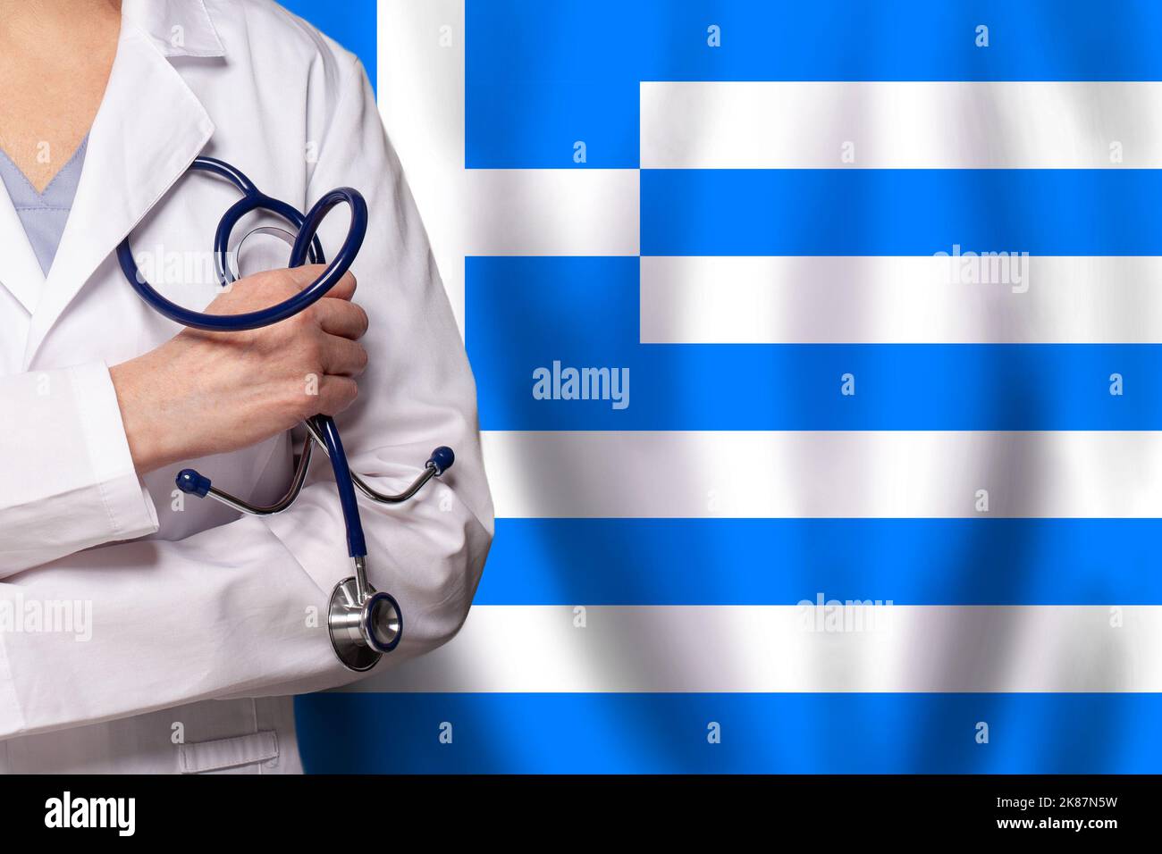 Greek medicine and healthcare concept. Doctor close up against flag of ...