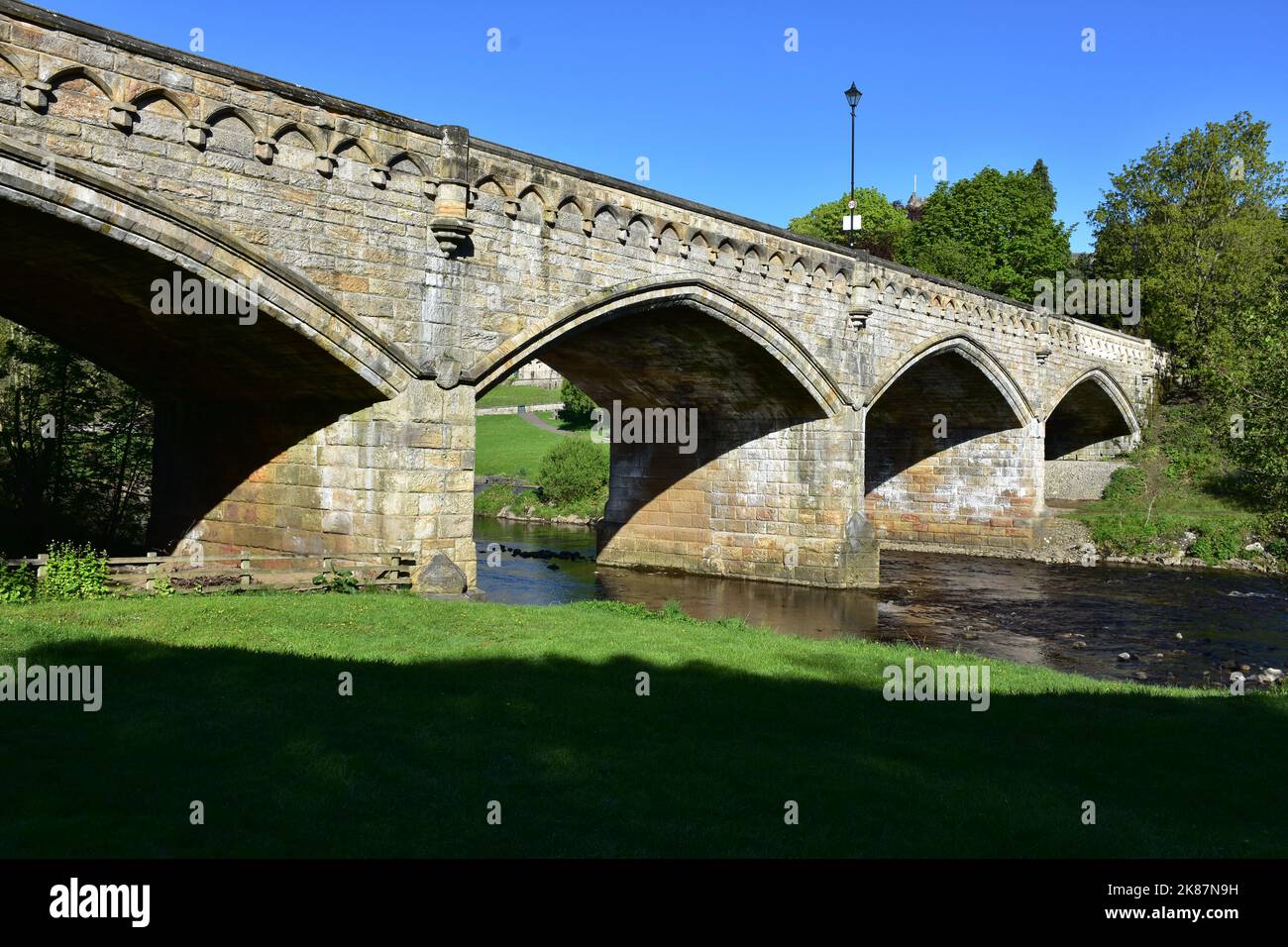 Attractive scenic bridge with multiple archways over a river Stock ...