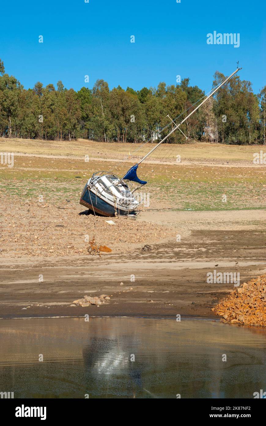 ship on land far from the water due to drought in vertical with ...